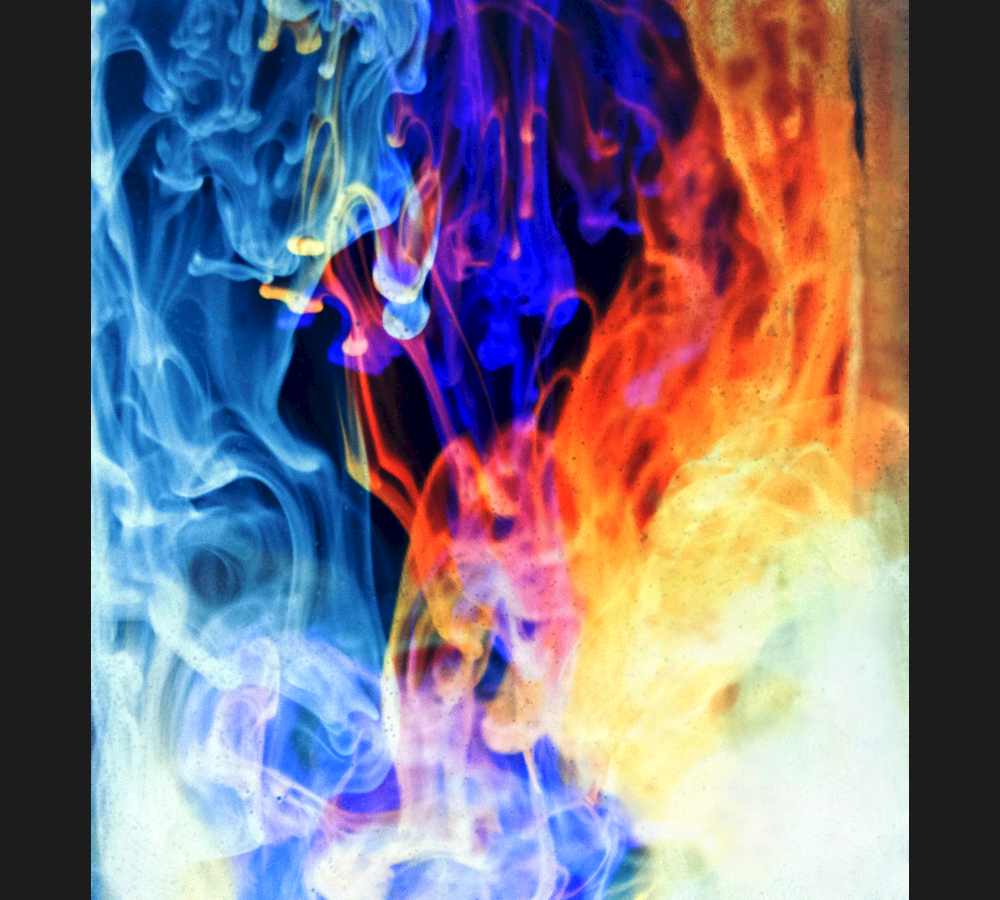 Food coloring manually swirled into corn syrup. - Flow Visualization