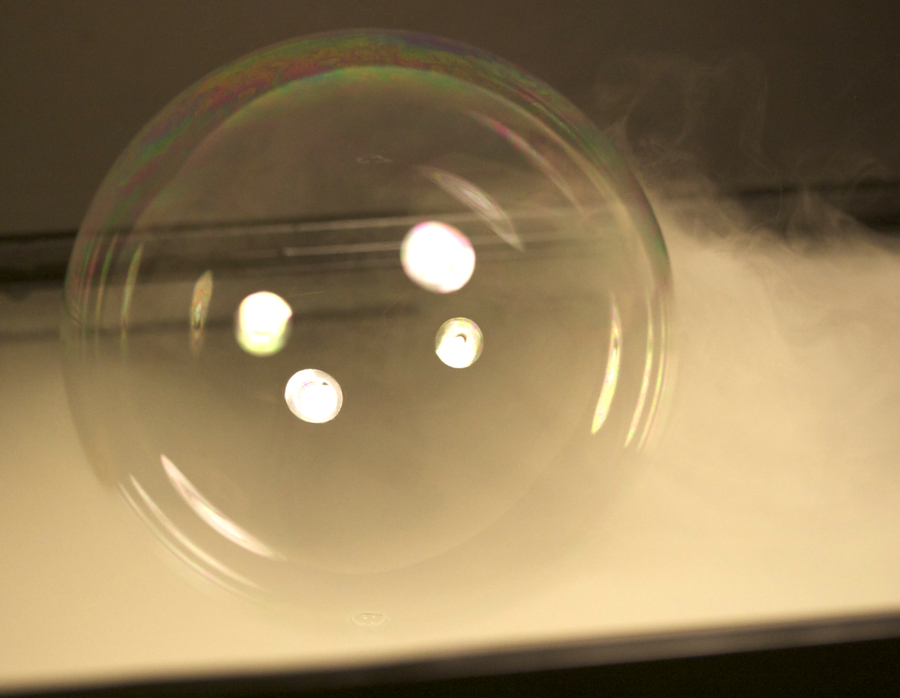An air-filled bubble is buoyant above a cold CO2-water fog. - Flow ...