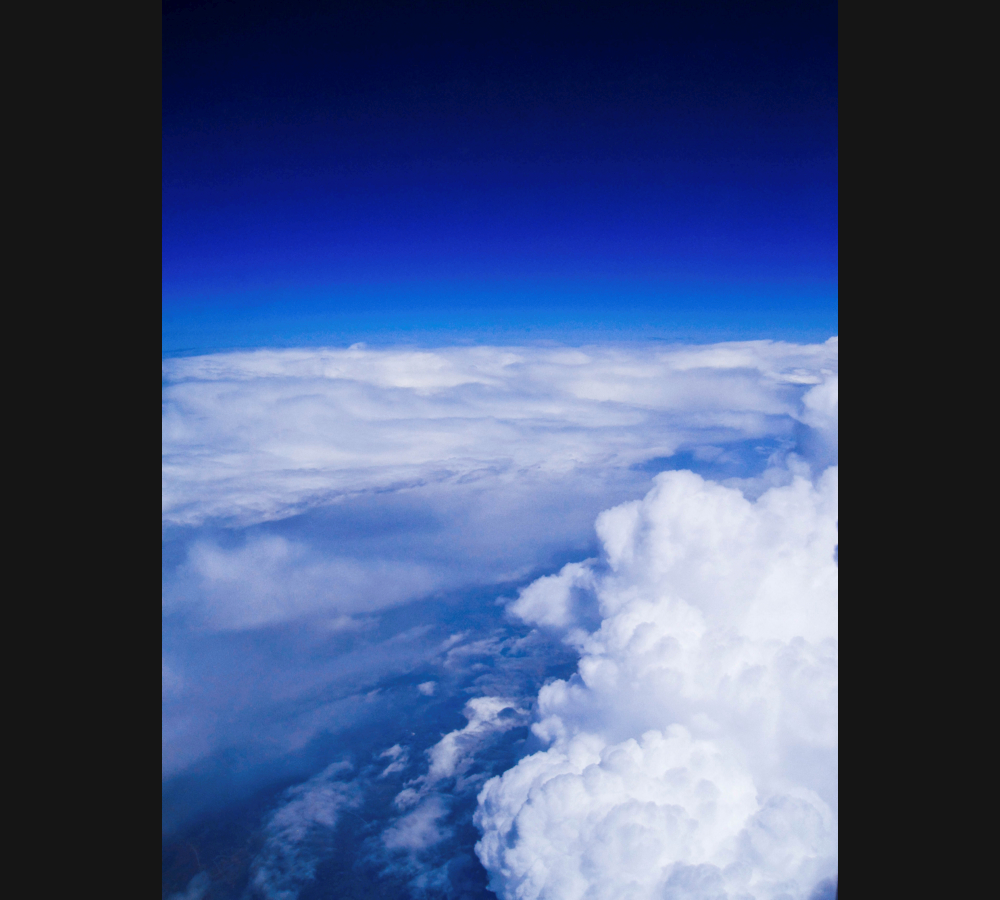 Cumulus and altostratus clouds seen from above near Fort Worth, TX, March 31, 2013, 2 pm. - Flow ...