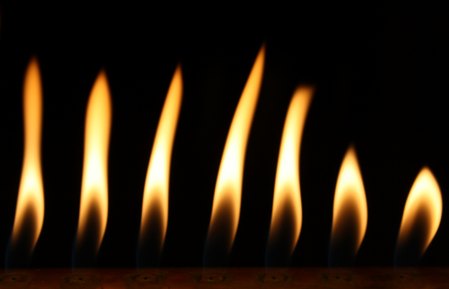 Standing acoustic waves in a Rubens' Tube drive flames of varying ...