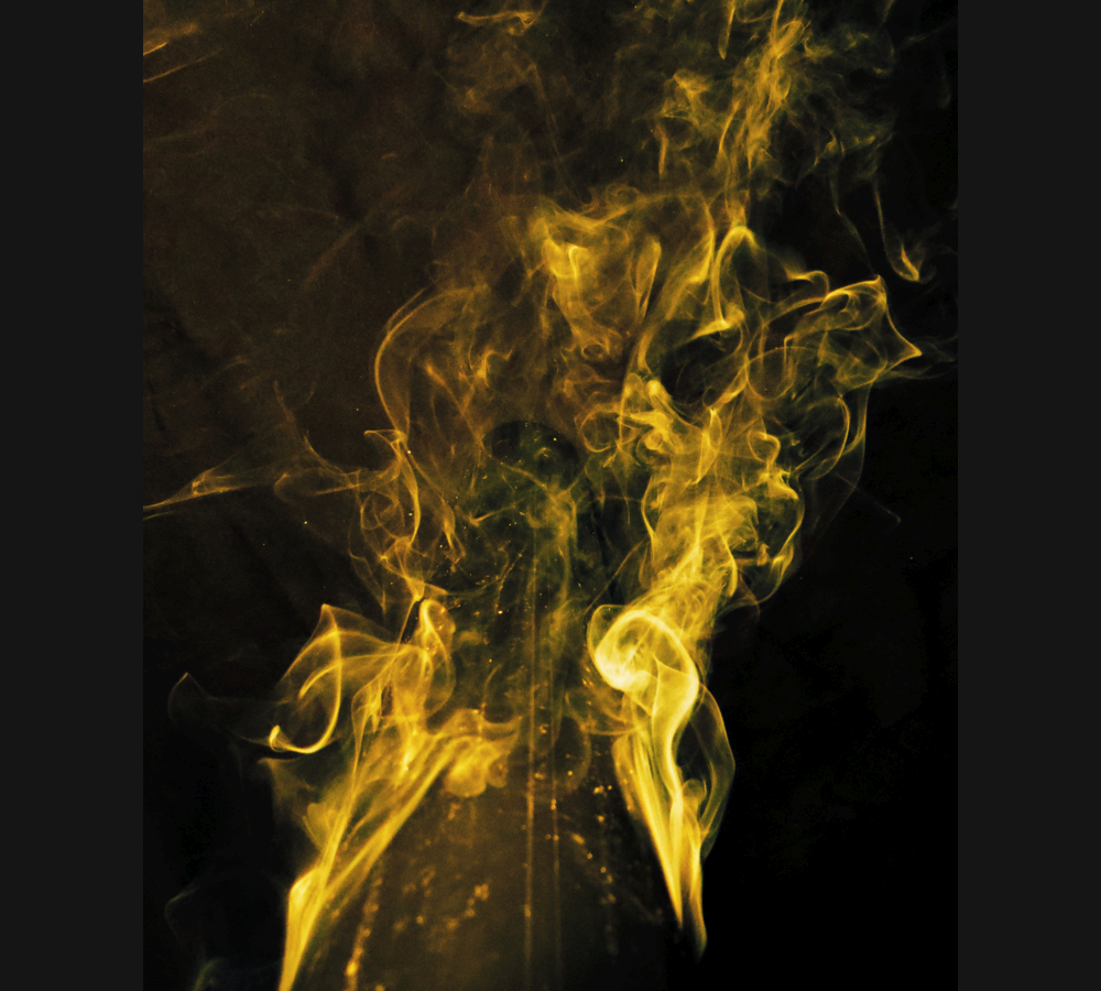 Smoke shows the turbulent wake behind a horizontal cylinder in a fume ...