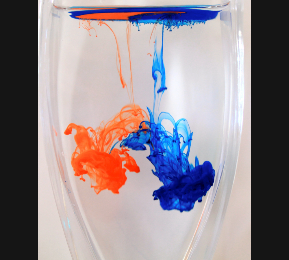 Dense India ink falls through water, displaying the 'umbrella' instability. - Flow Visualization