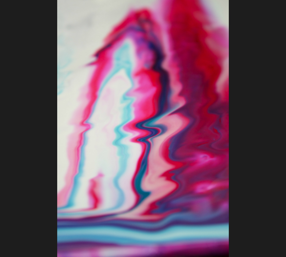 Dyed oobleck flows down an incline. - Flow Visualization