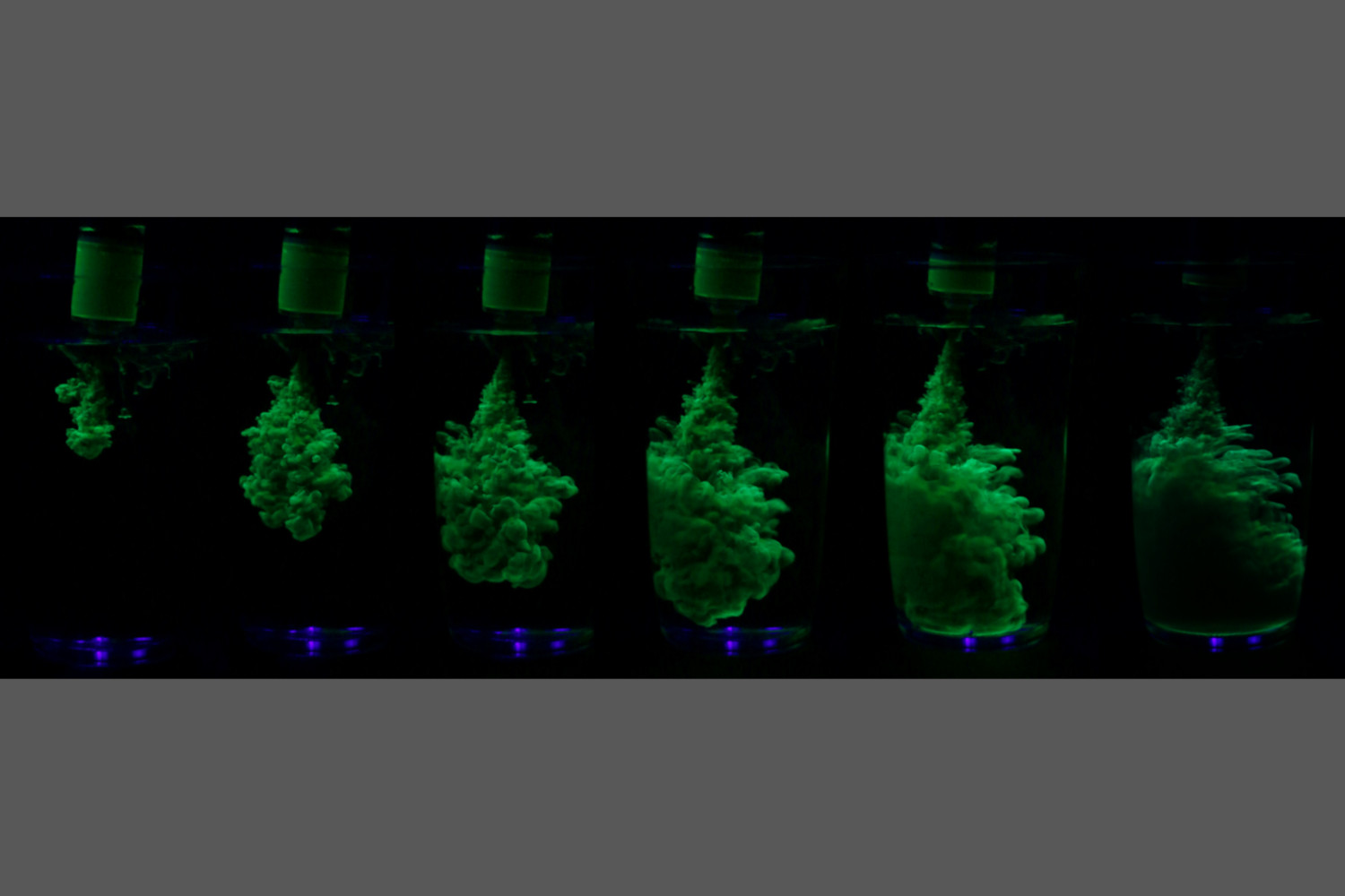 Fluorescent dye injected into a stagnant glass of water by Daniel ...