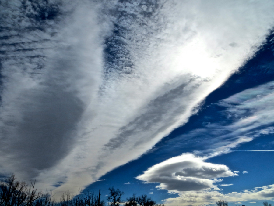 Altocumulus lenticularis, mountain wave clouds, were captured at 12:25 pm on February 14, 2014 ...