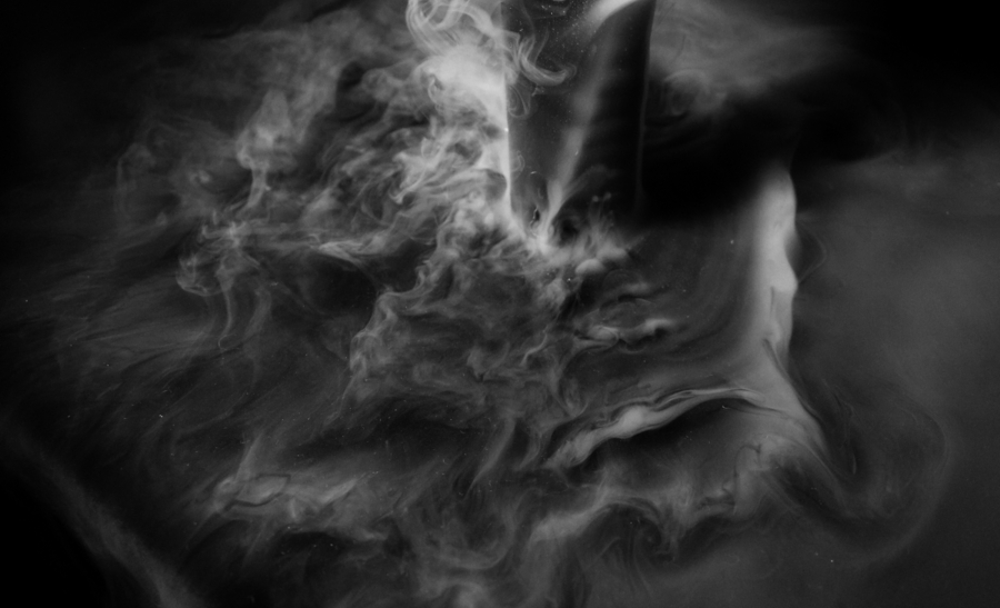 Cold fog spilling over black velvet illustrates a relaminarizing wall ...