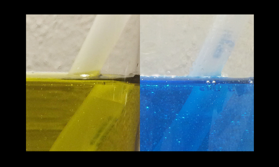 A pen appears broken due to the different index of refraction in air ...