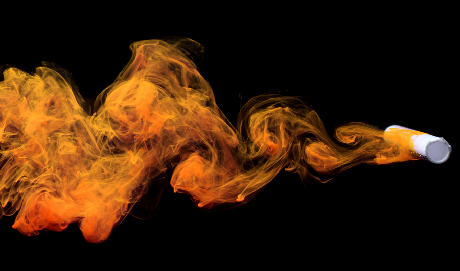 Highlighter dye visualizes a transitional Karman vortex street at Re ...